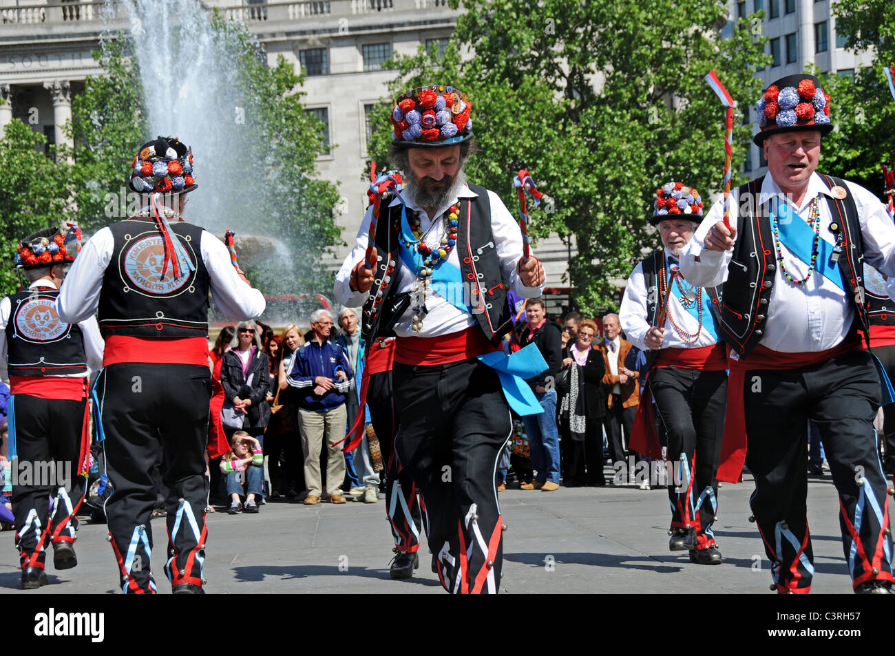 Morris Dancers dancing in Trafalgar Square London Stock Photo - Alamy