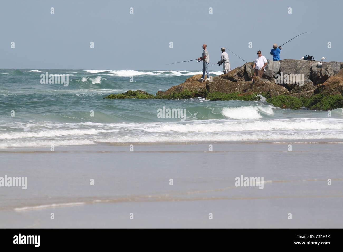 The locals in Florida casting their fishing rods Stock Photo - Alamy