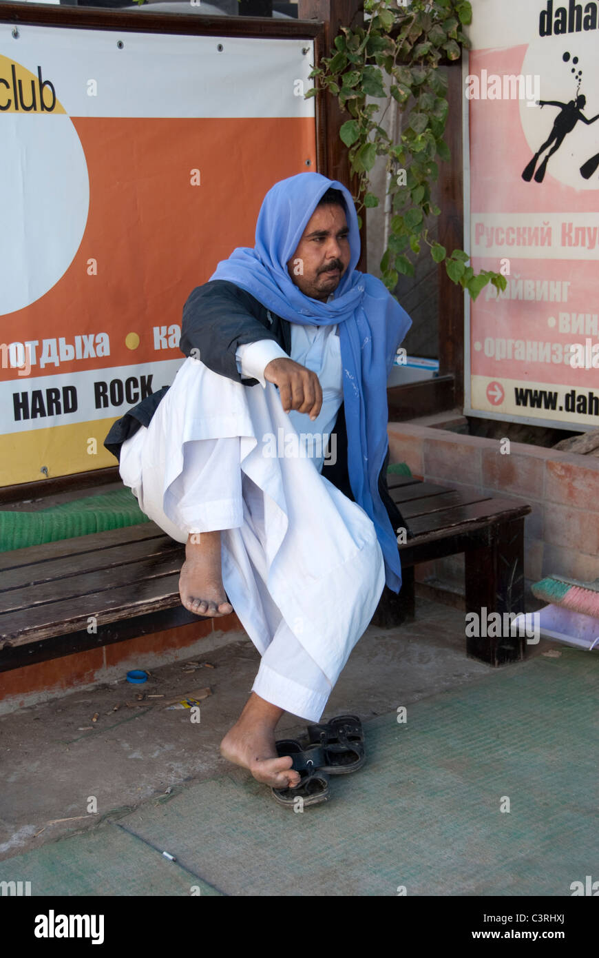 Muzeina Tribe bedouin sitting on a bench - Dahab, Sinai Peninsula ...