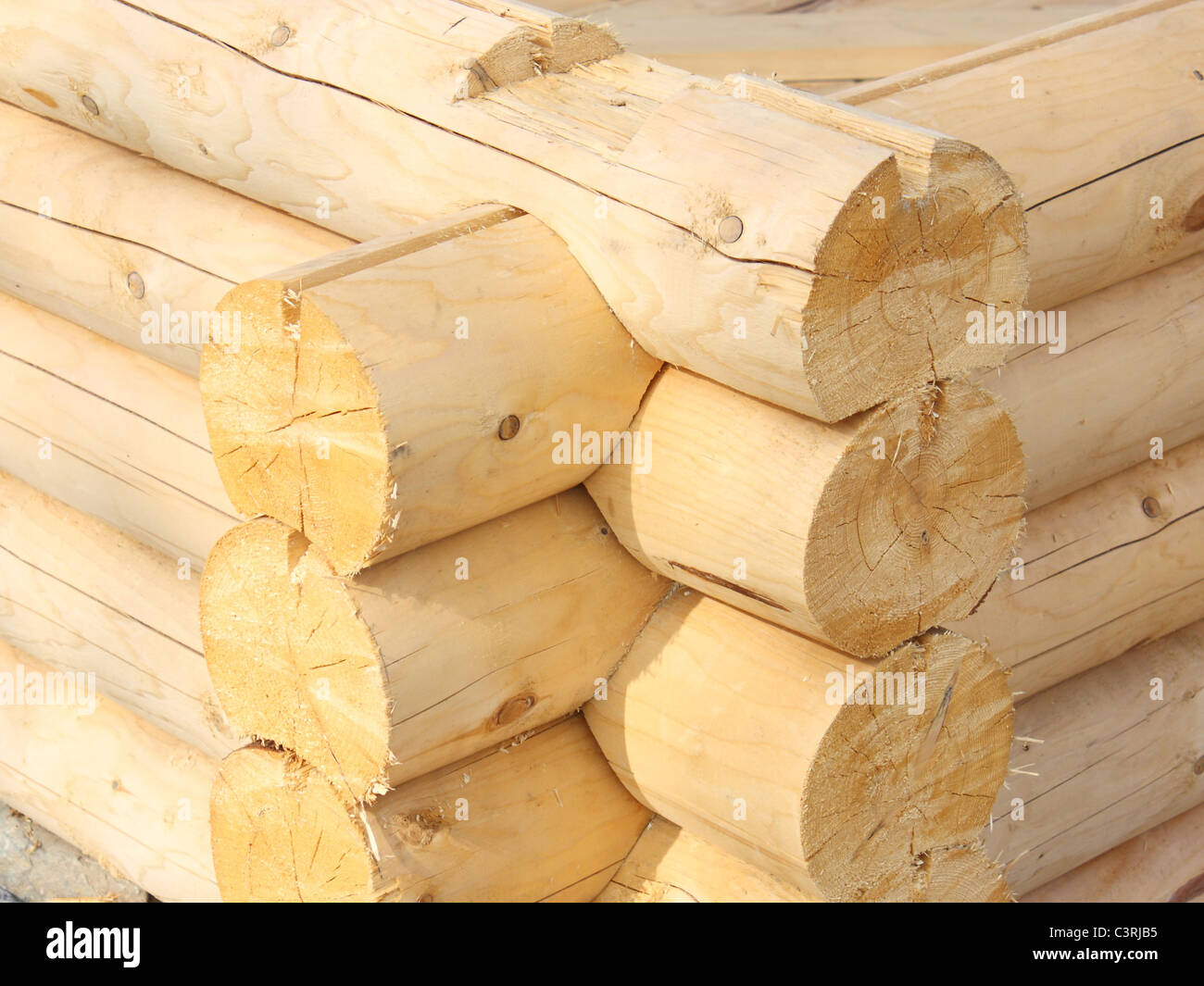 Wall of a rural log house from the fresh cut logs Stock Photo - Alamy