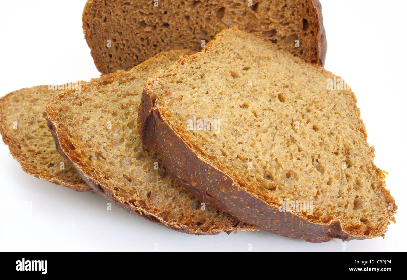 Black rye bread with the fried crust is isolated on a white background ...