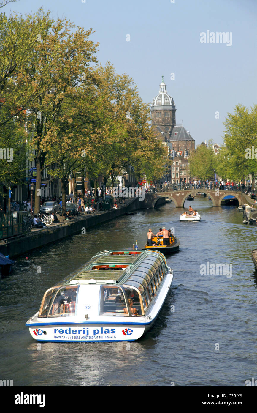 TOURIST BOAT & ST. NICHOLAS CATHEDRAL FROM LIESDELSLUIS BRIDGE ...