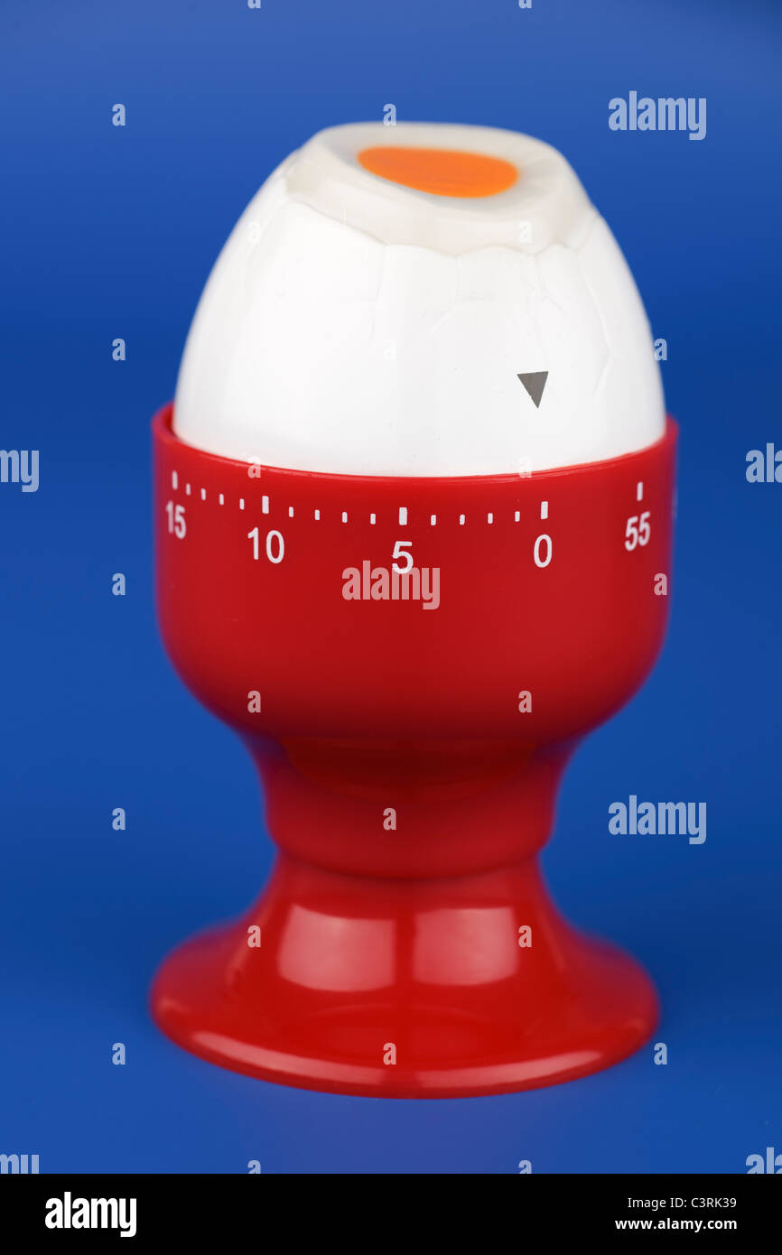 Plastic clockwork egg timer Stock Photo - Alamy