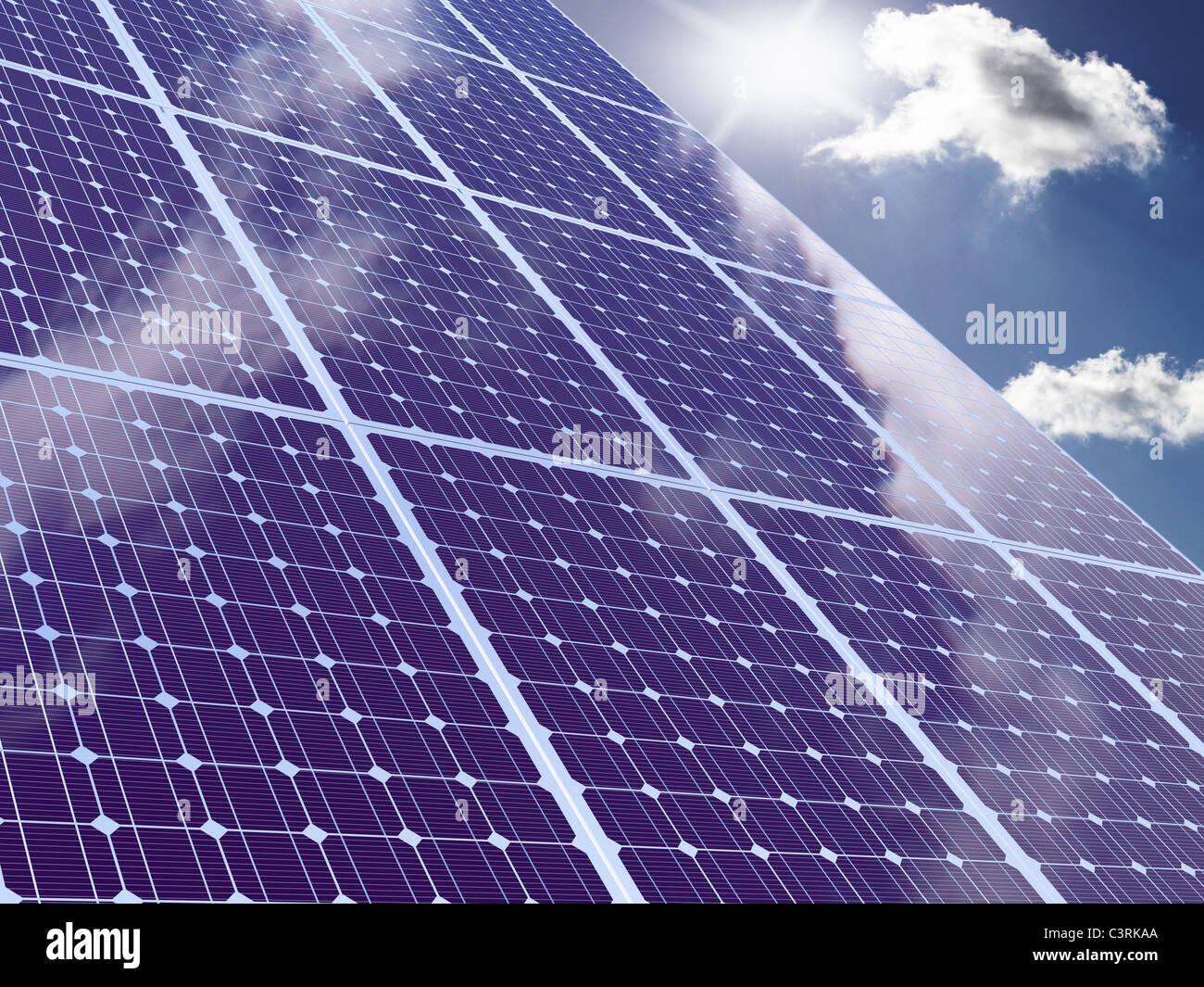 Blue solar panel with clouds in background Stock Photo - Alamy