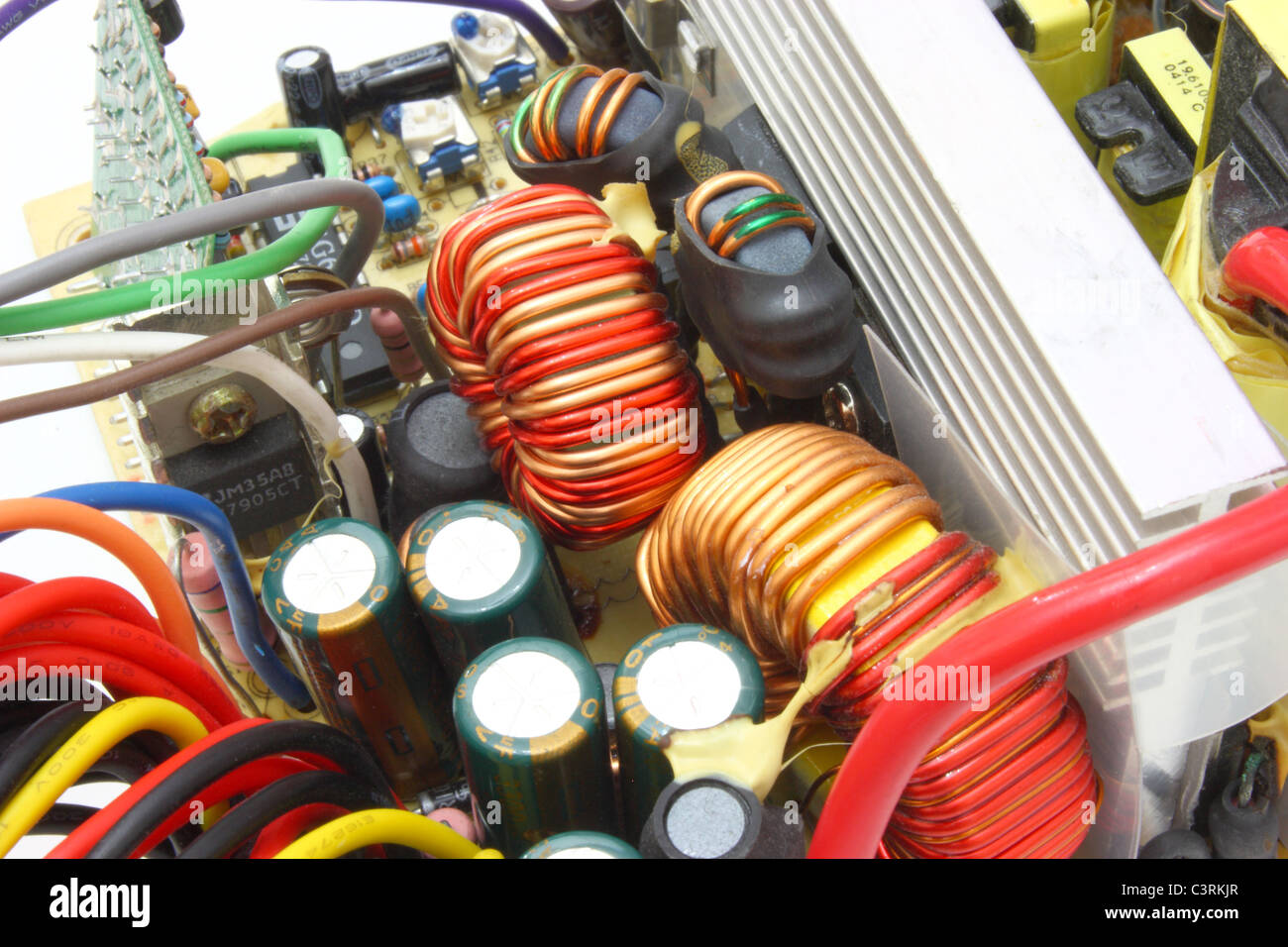 The computer power unit in an open kind with details and electric wires ...