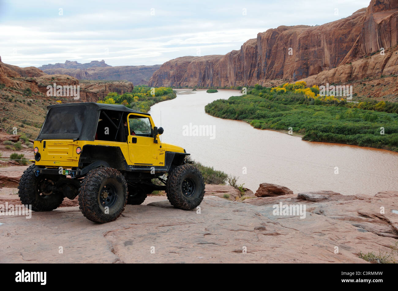 Jeep Travels Down Rugged Moab Rim Trail Stock Photo - Alamy