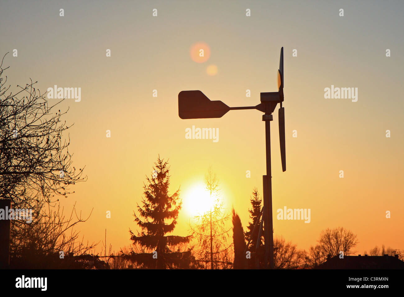 Windmill in sunset Stock Photo - Alamy