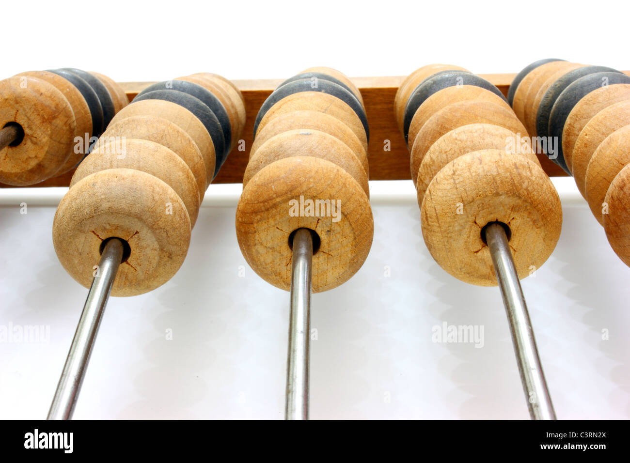 Accounting abacus for financial calculations lies on a white background ...