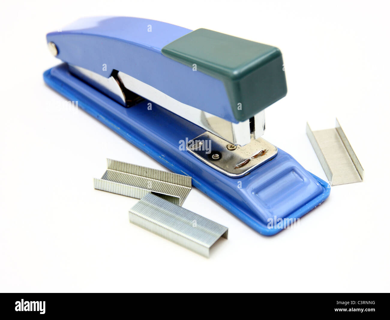 Blue strip stapler isolated on white background Stock Photo - Alamy