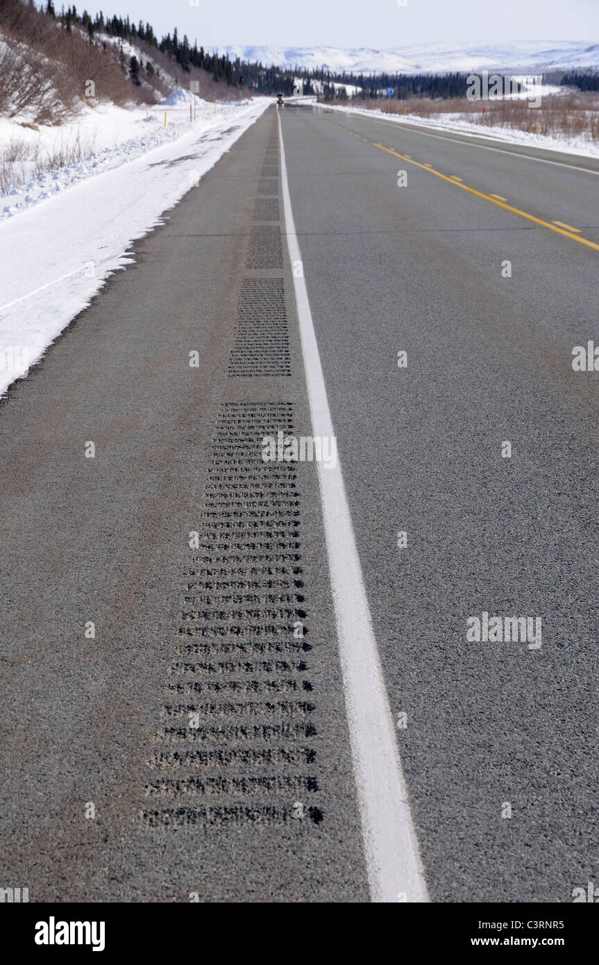 Rumble Strips on Alaska Highway in Winter Stock Photo - Alamy