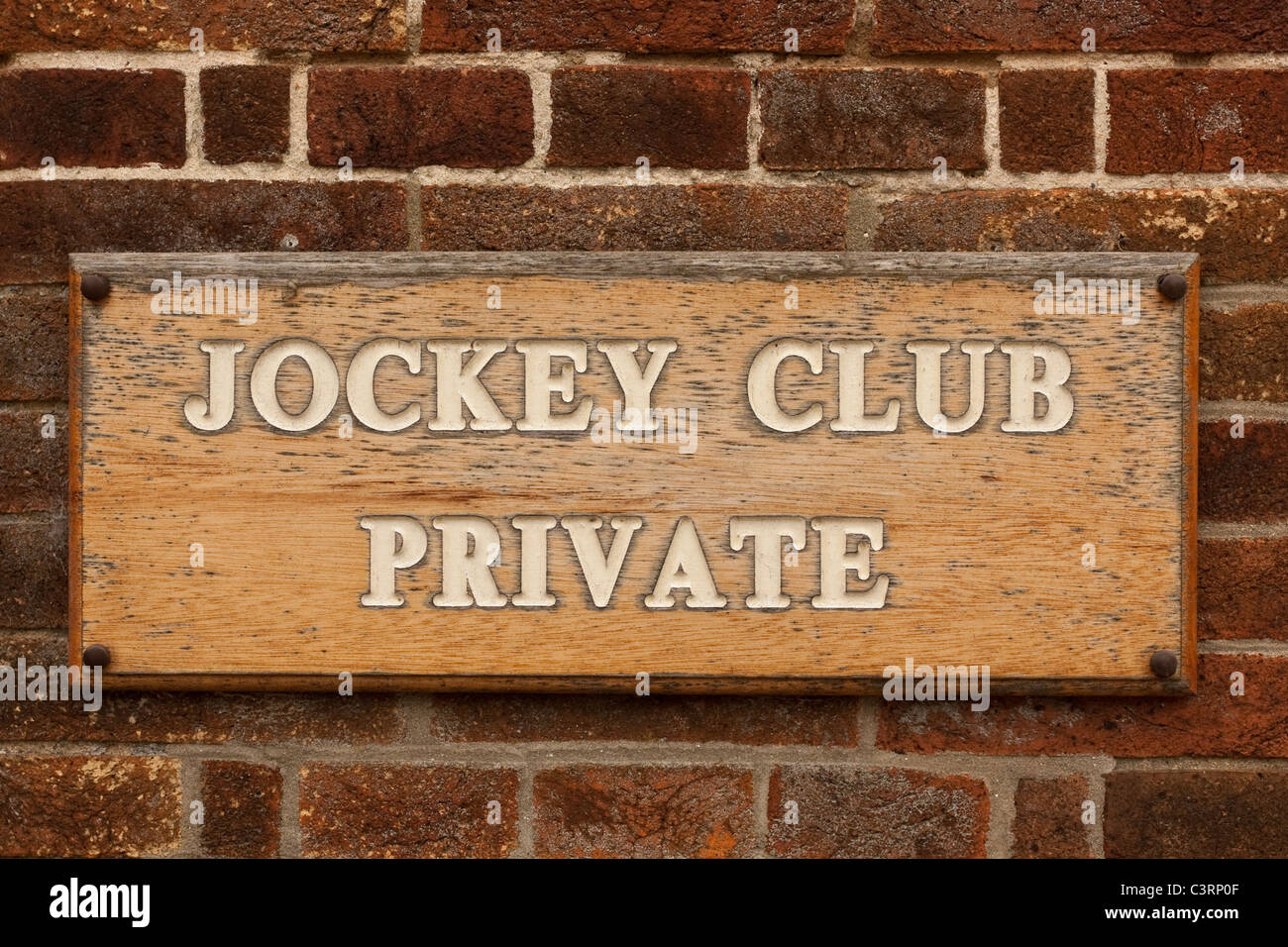 Wooden sign for a jockey club in Newmarket, UK Stock Photo - Alamy
