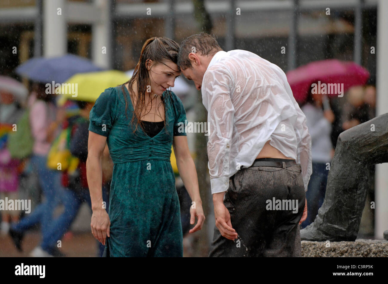 Woman in soaking wet dress hi-res stock photography and images - Alamy