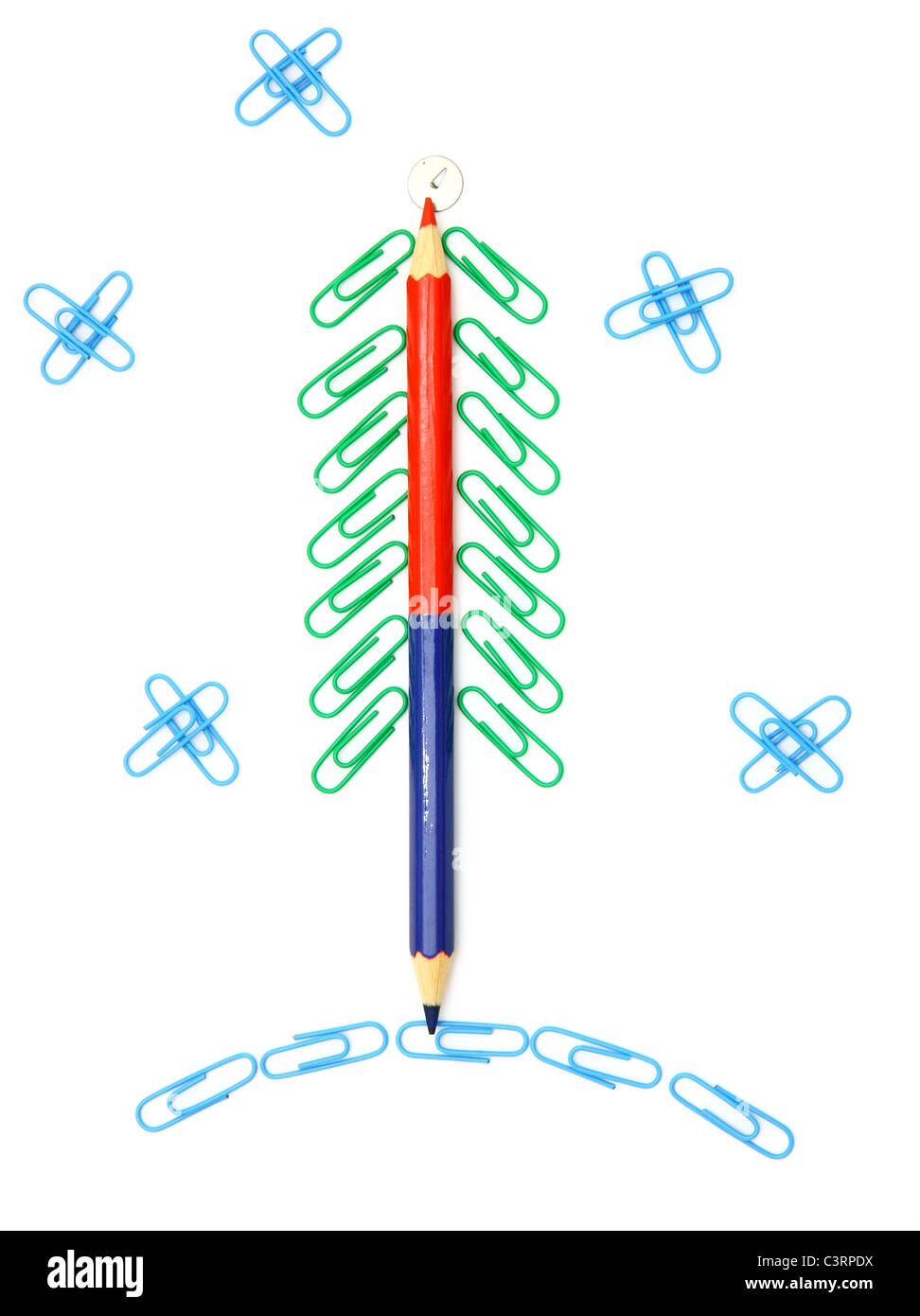 Christmas fur-tree from paper clips for a paper on a white background ...