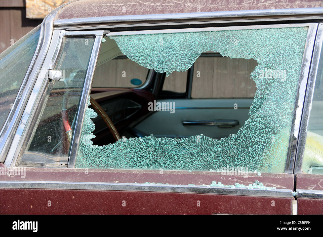 Old Dirty Car with Busted Window Stock Photo - Alamy