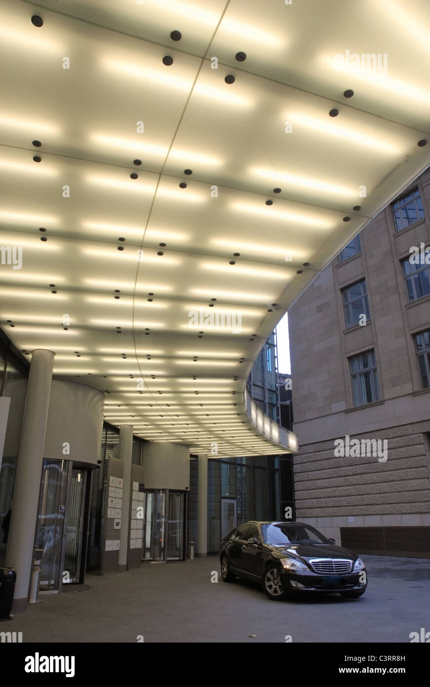 Luxury car parked under a modern ceiling Stock Photo - Alamy