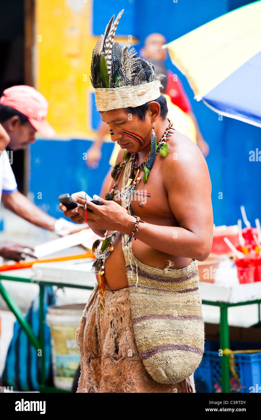 Man dressed as indigenous native using cellphones in Cartagena ...