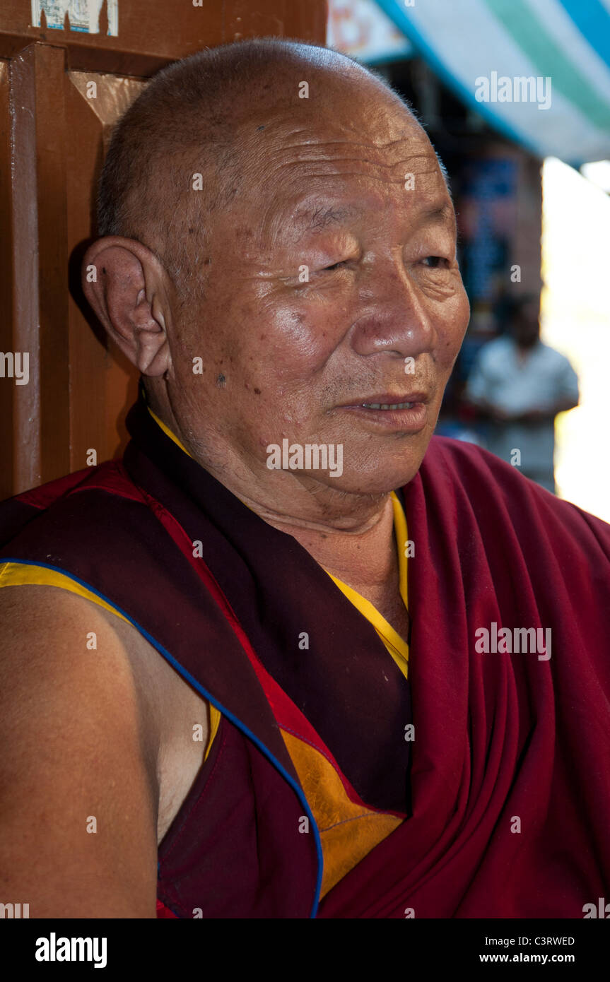 Tibetan Buddhist monk at the ancient stupa of Swayambunath, Kathmandu ...