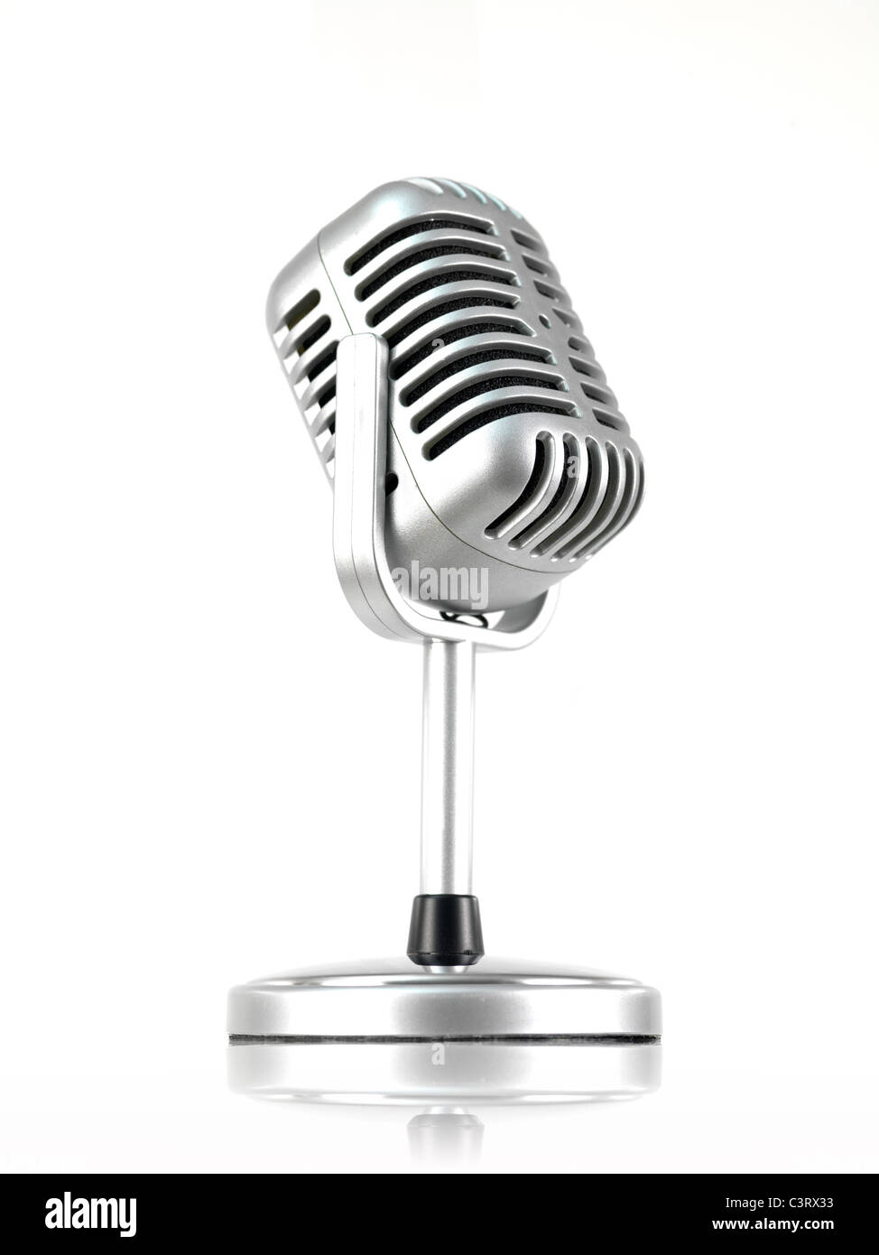 A microphone isolated against a white background Stock Photo - Alamy