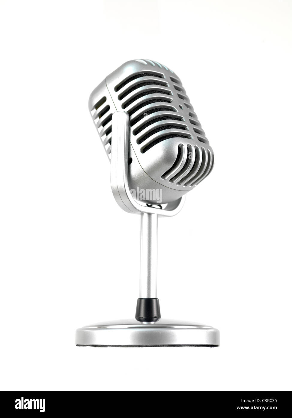 A microphone isolated against a white background Stock Photo - Alamy
