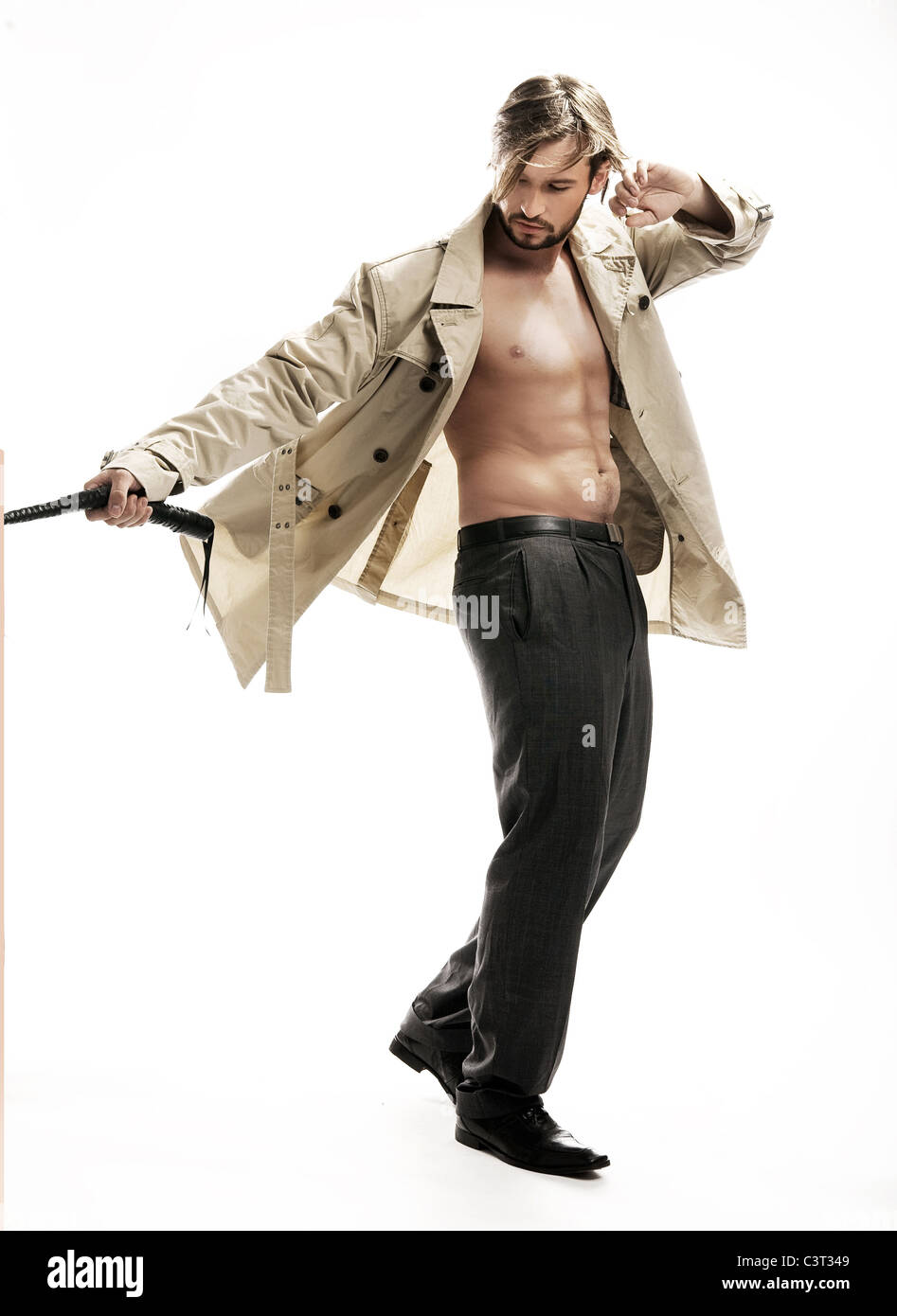 Handsome man pulling a line Stock Photo - Alamy