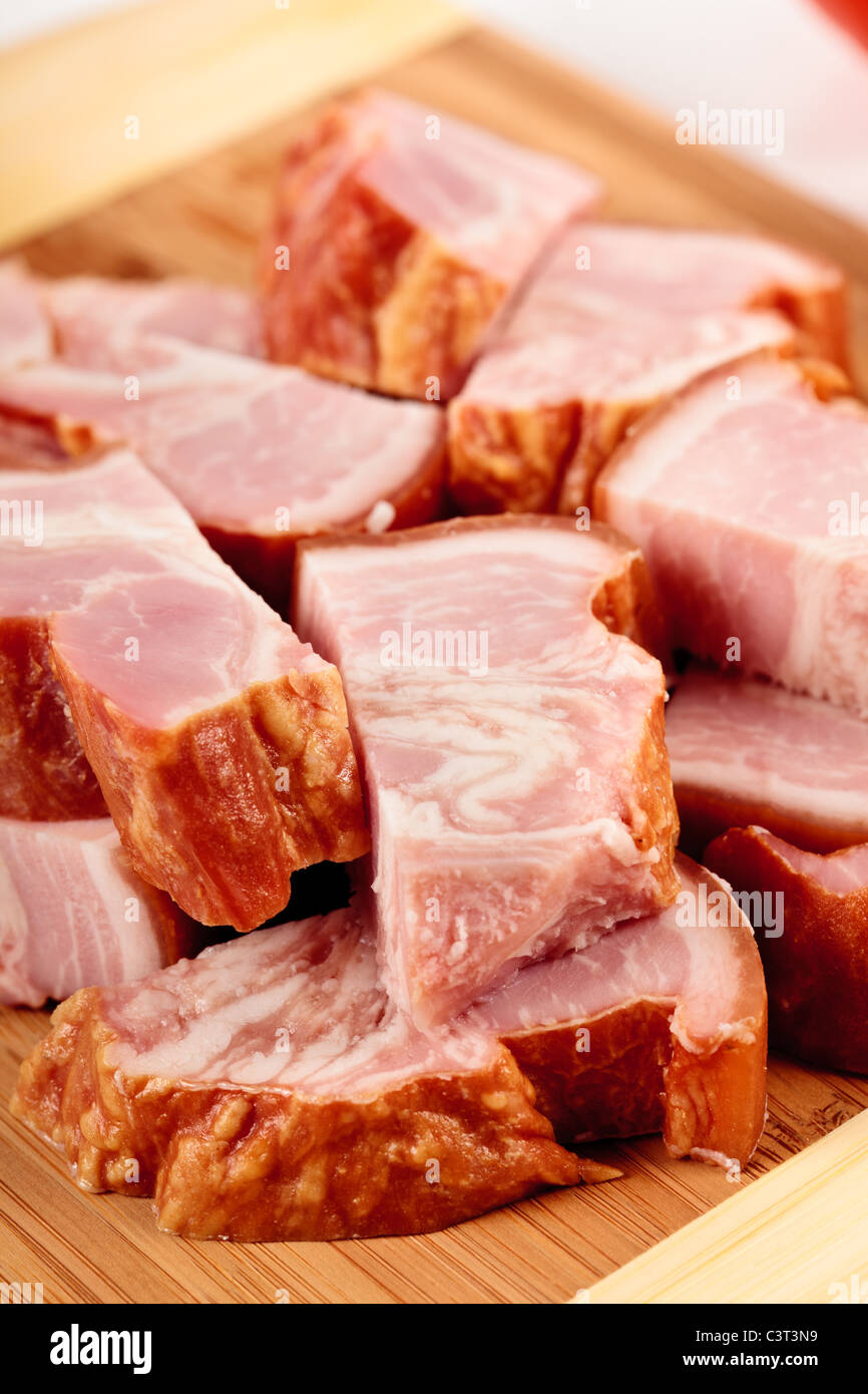 Closeup studio shot of sliced smoked bacon Stock Photo - Alamy