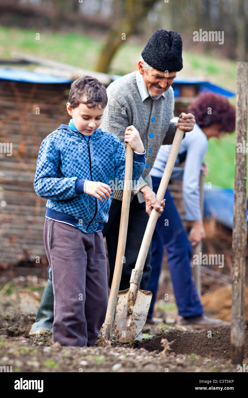 Child gardening grandpa hi-res stock photography and images - Alamy