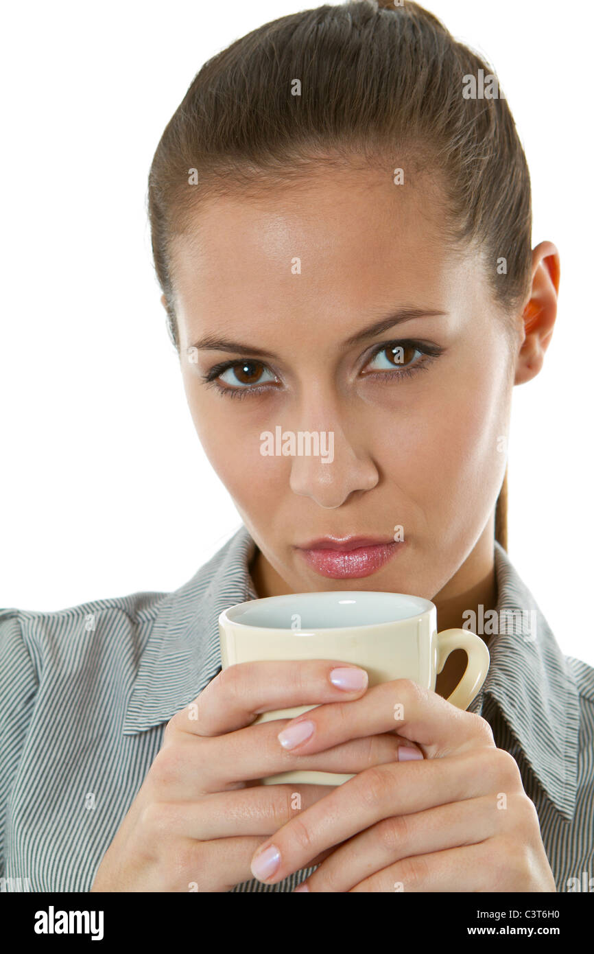 Young woman drinking coffee Stock Photo - Alamy