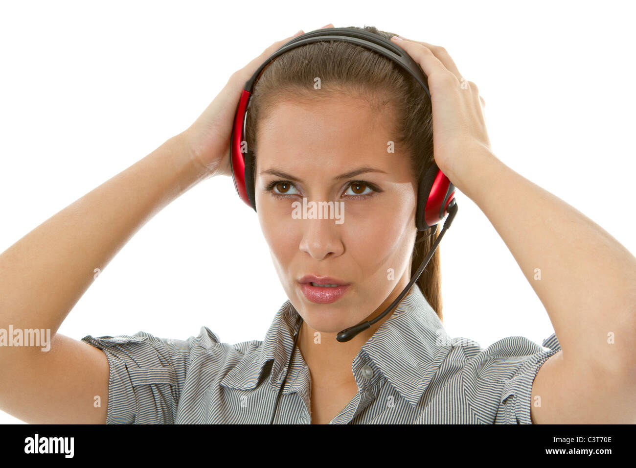 Scared woman with a headset in the office Stock Photo - Alamy