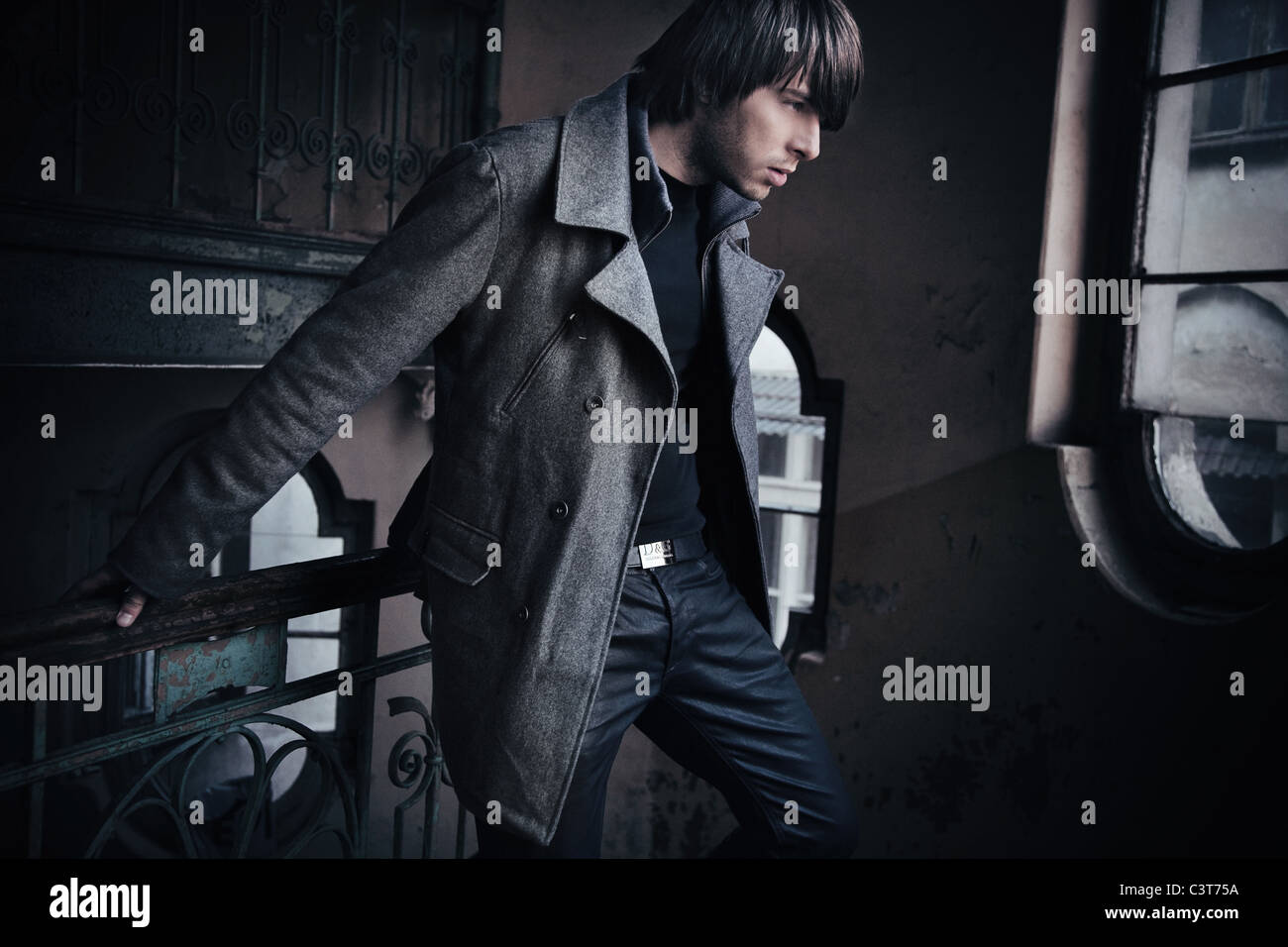 Handsome man posing and working Stock Photo - Alamy