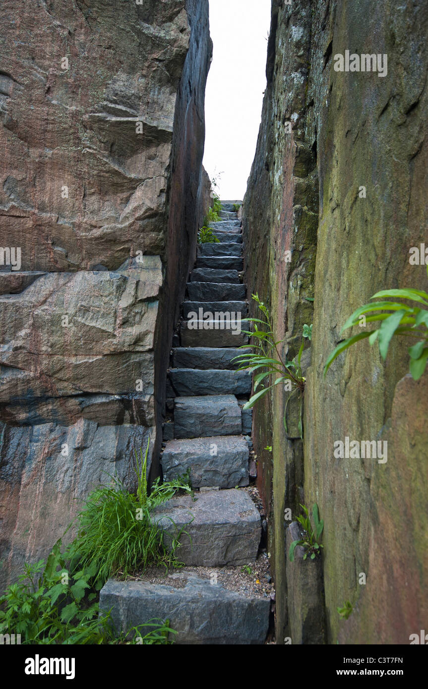A stone staircase through rock Stock Photo - Alamy