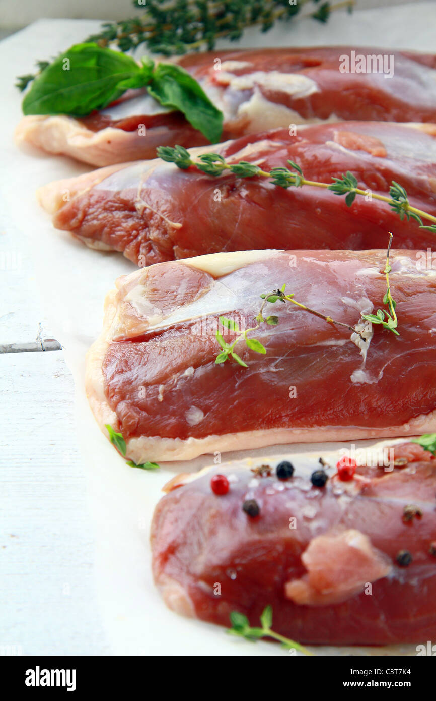 raw meat, duck fillet with spices and herbs Stock Photo - Alamy