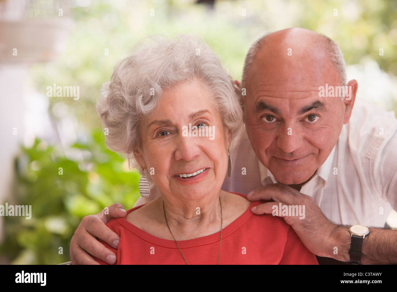 Smiling Hispanic couple Stock Photo - Alamy