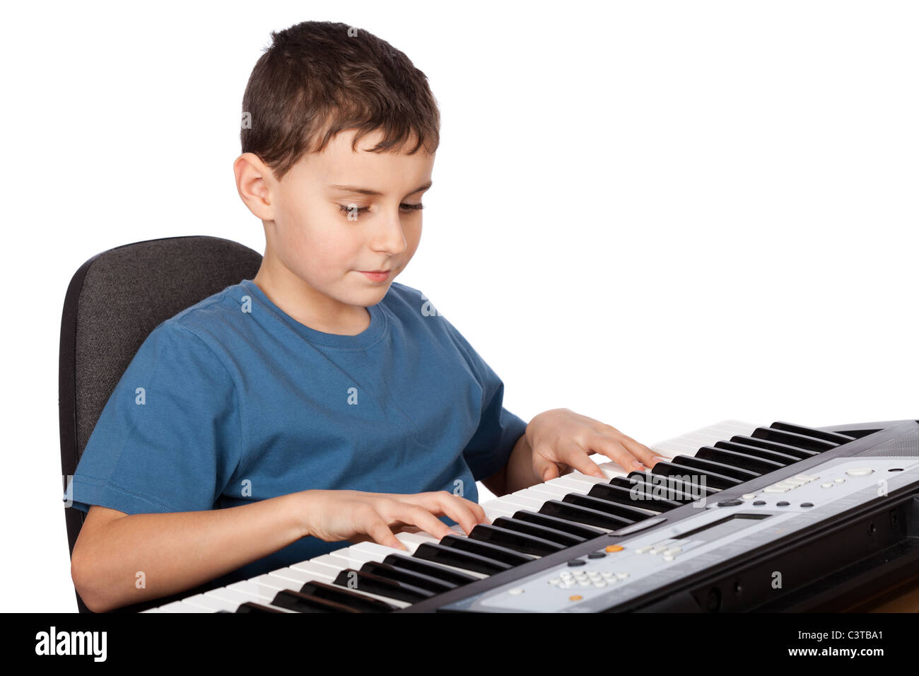 Cute kid playing piano, isolated on white background Stock Photo - Alamy