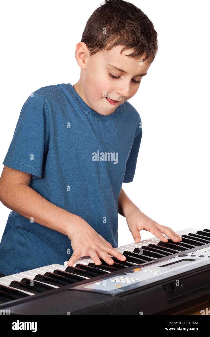 Cute kid playing piano, isolated on white background Stock Photo - Alamy