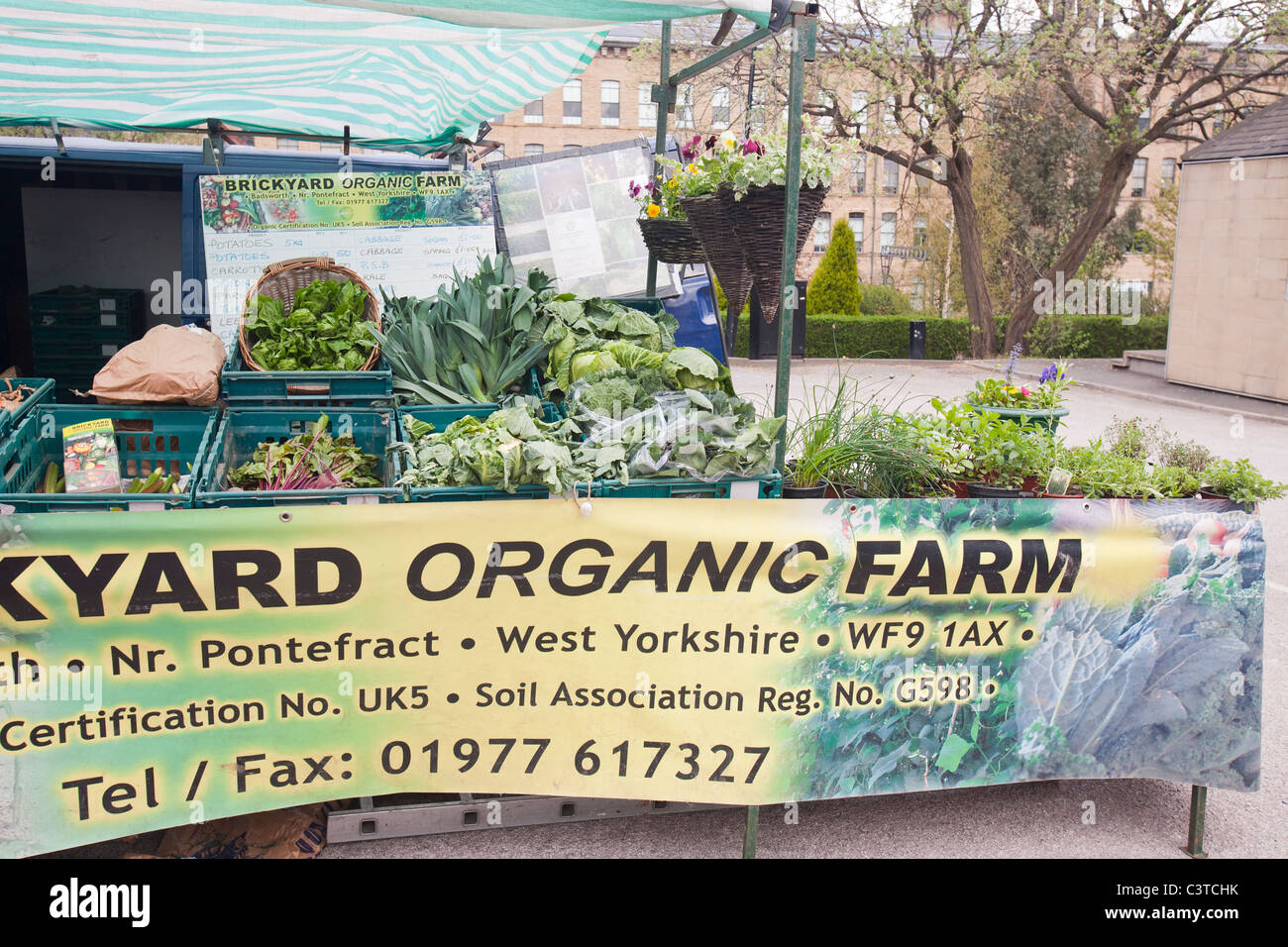 An organic farm stall selling organic vegetables at a market in ...
