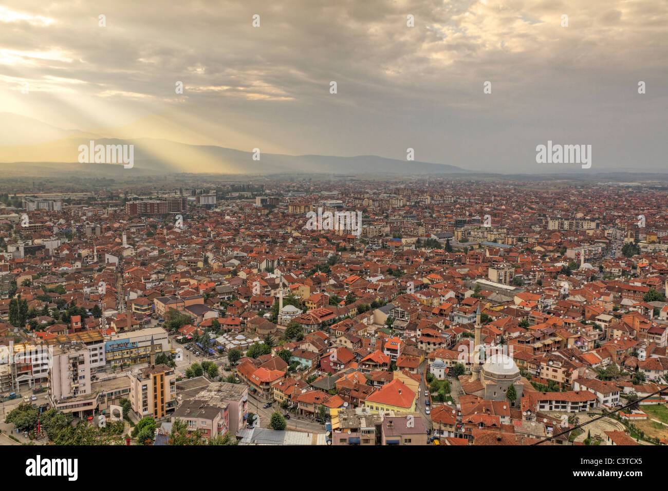 city scape of second biggest city Prizren in Kosovo at sunset with red ...