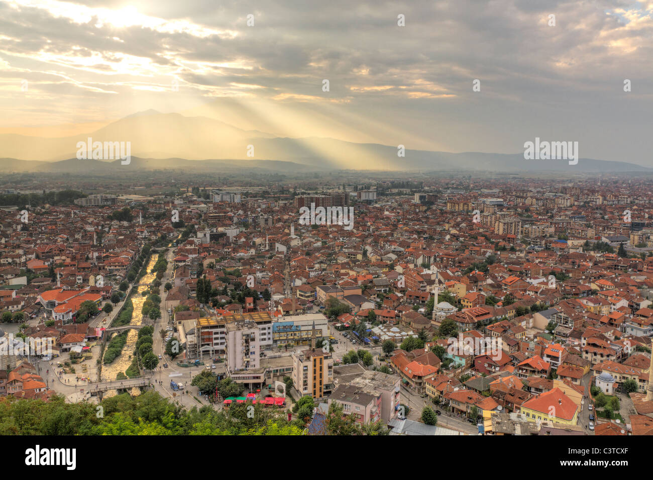 city scape of second biggest city Prizren in Kosovo at sunset with red ...