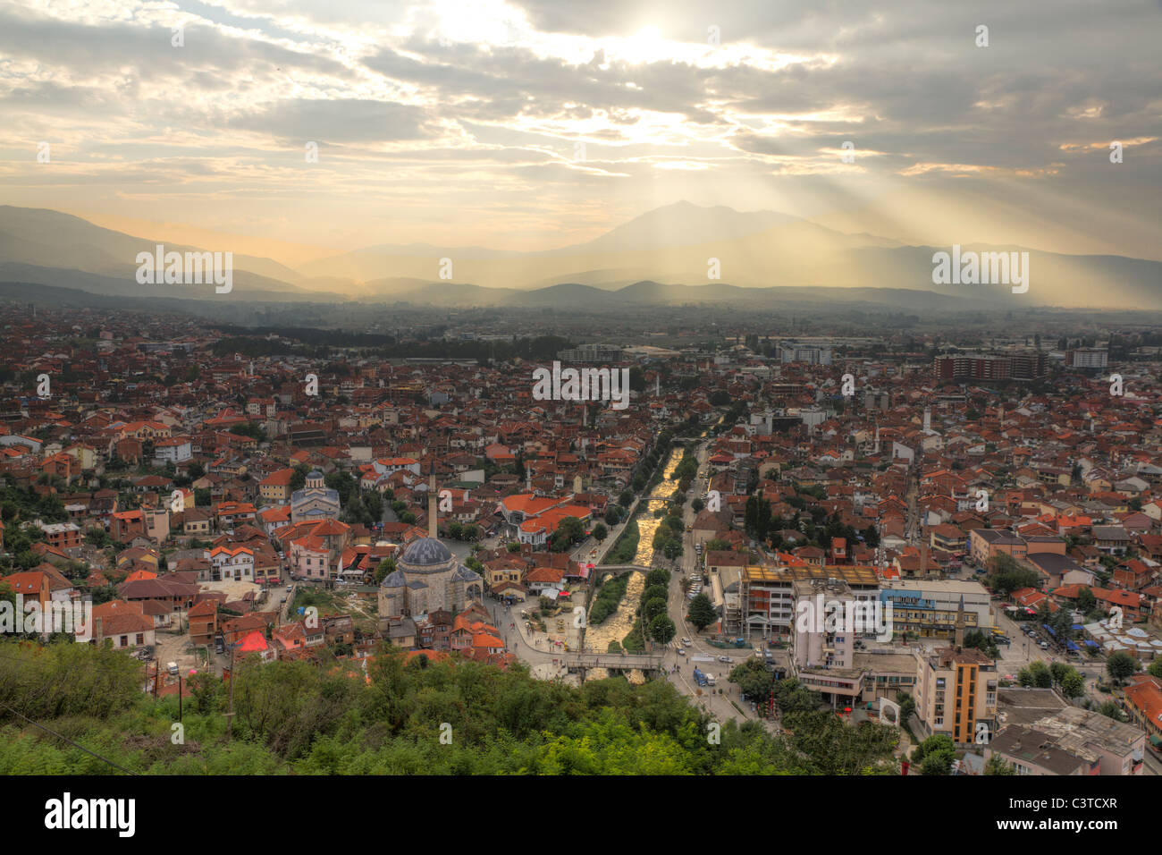 city scape of second biggest city Prizren in Kosovo at sunset with red ...