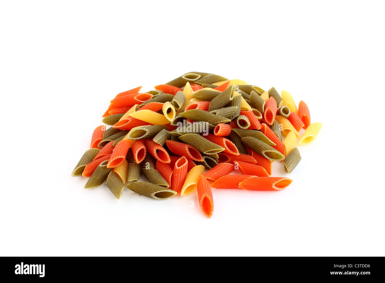 Raw colored pasta isolated on white background Stock Photo - Alamy