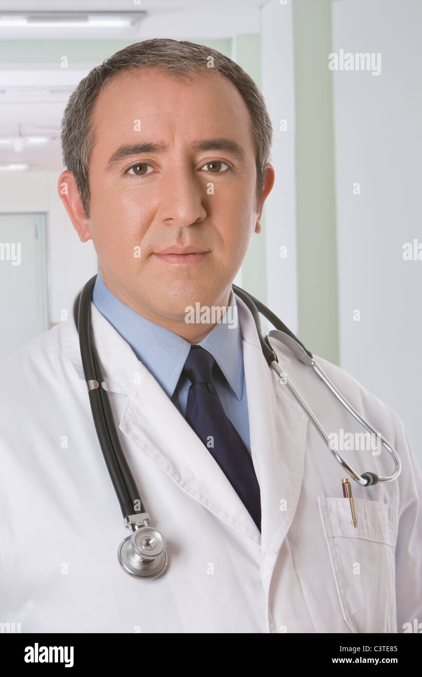 Serious Hispanic doctor Stock Photo - Alamy