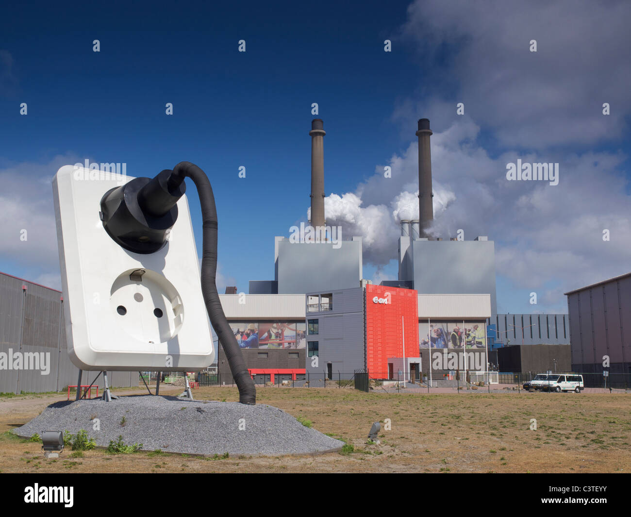 Electricity huge wall socket and plug in front of E-on powerplant ...