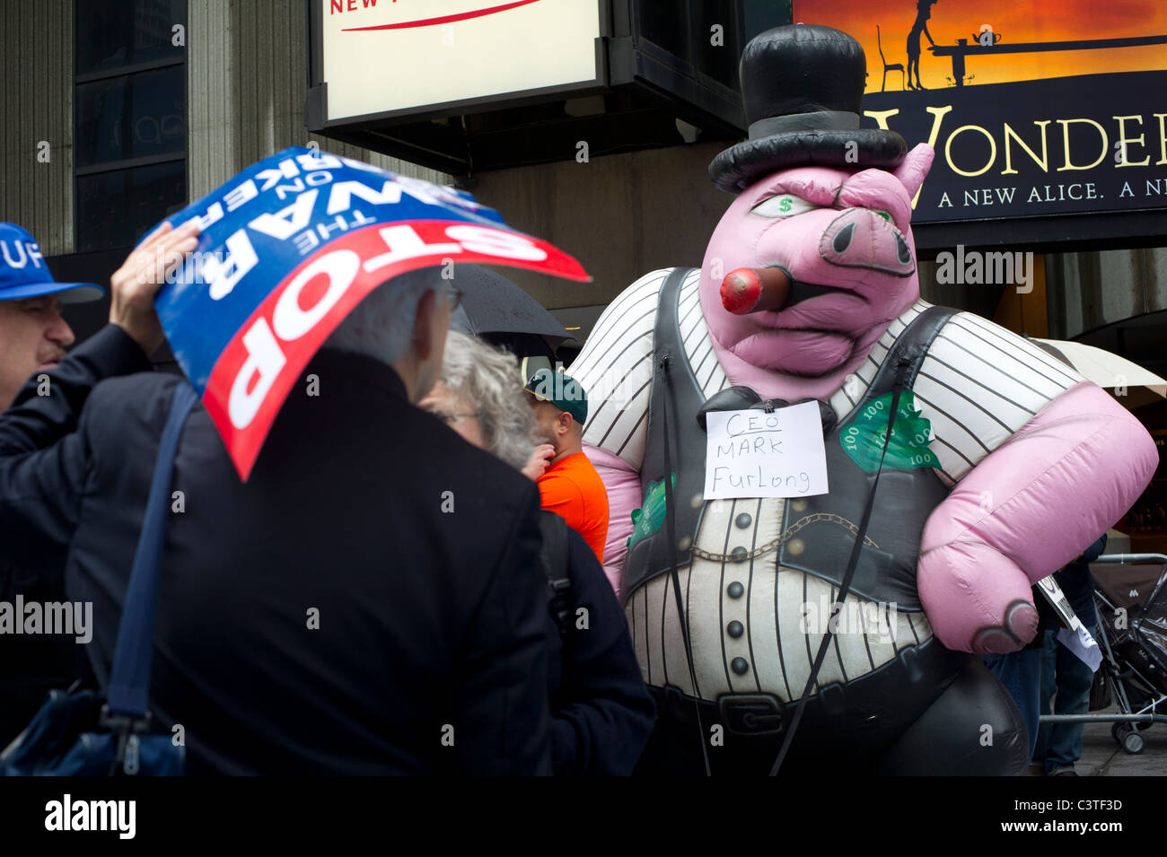 Union members and their supporters protest in Times Square Stock Photo ...