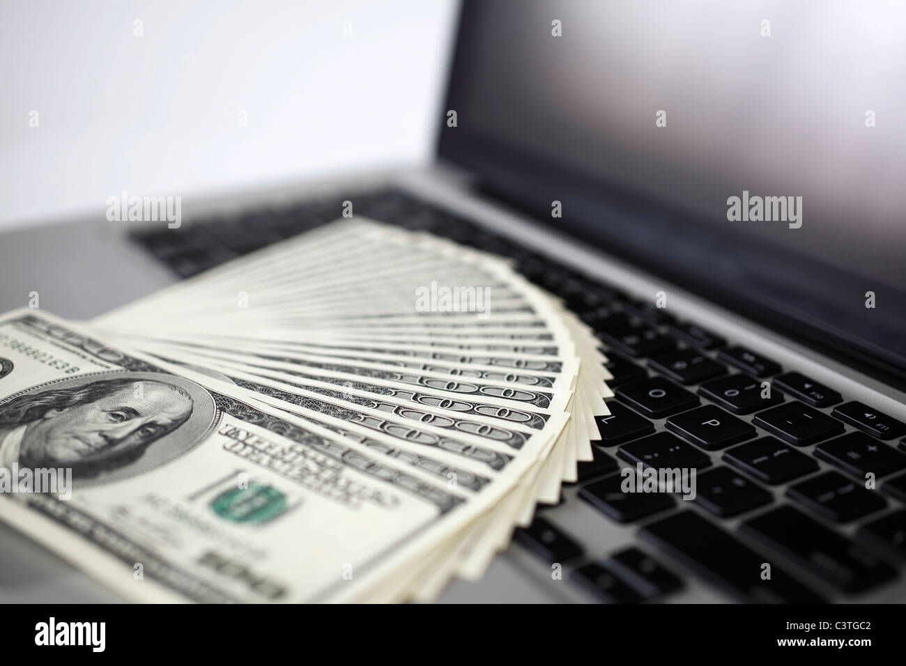 Computer keyboard and money Stock Photo - Alamy