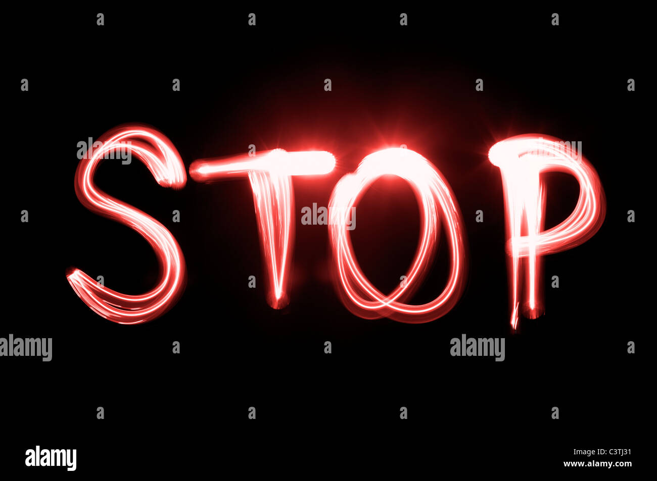 Word STOP written with flashlight Stock Photo - Alamy
