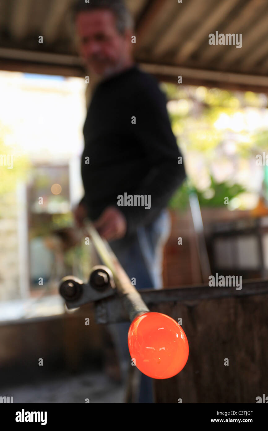 Robert Pierini and his son are both glass blower master. They are ...