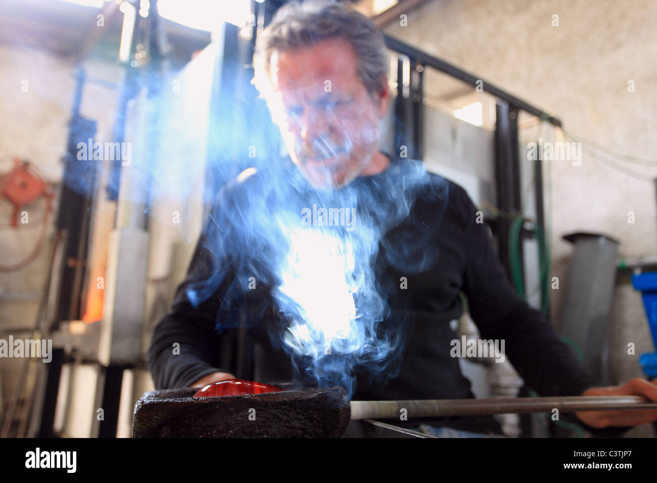 Robert Pierini and his son are both glass blower master. They are ...