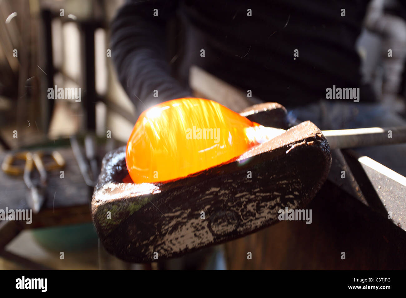 Robert Pierini and his son are both glass blower master. They are ...