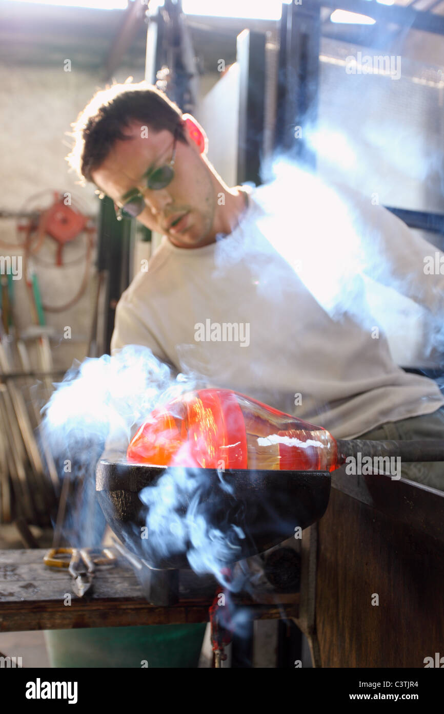 Robert Pierini and his son are both glass blower master. They are ...
