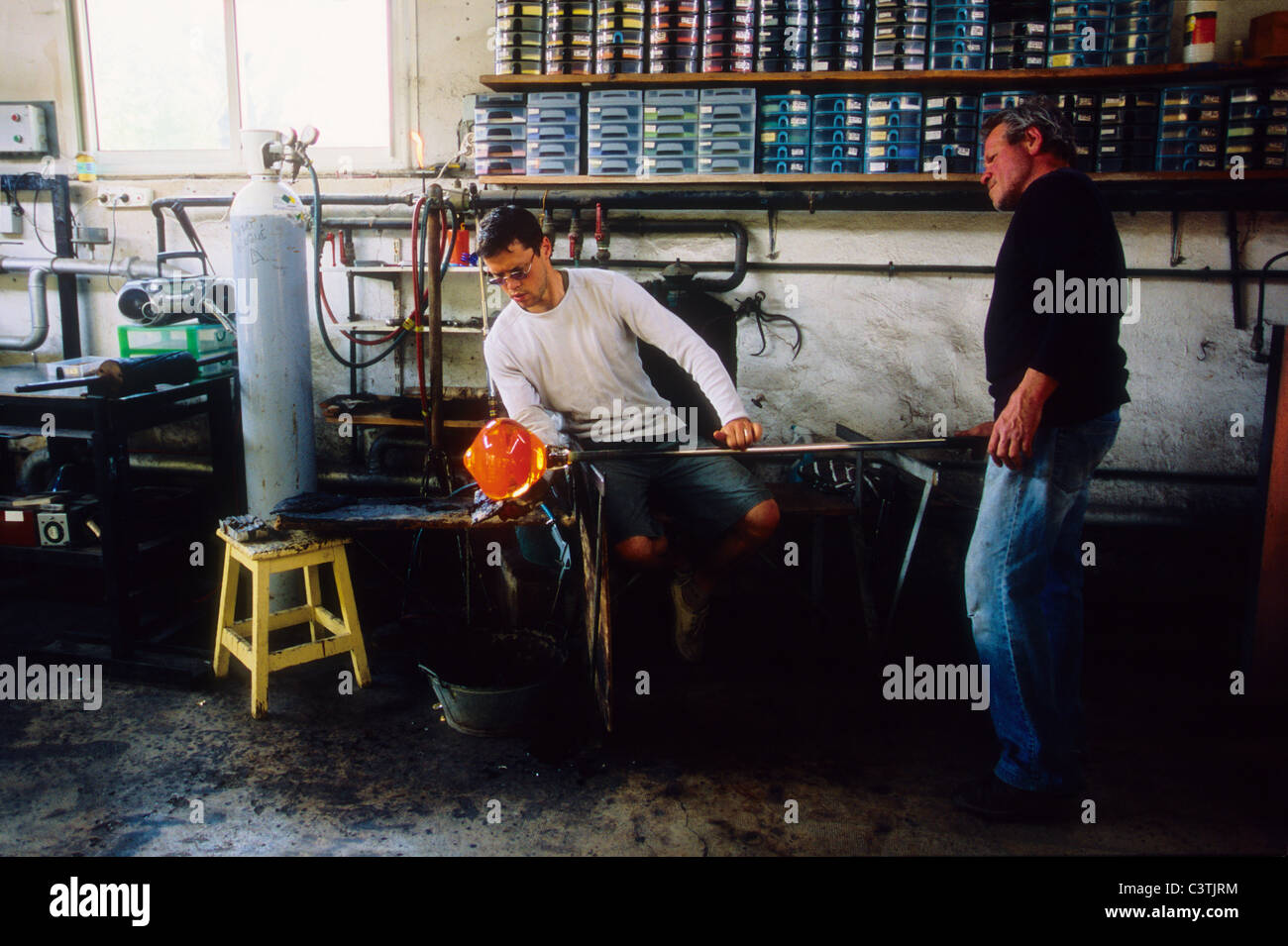 Robert Pierini and his son are both glass blower master. They are ...