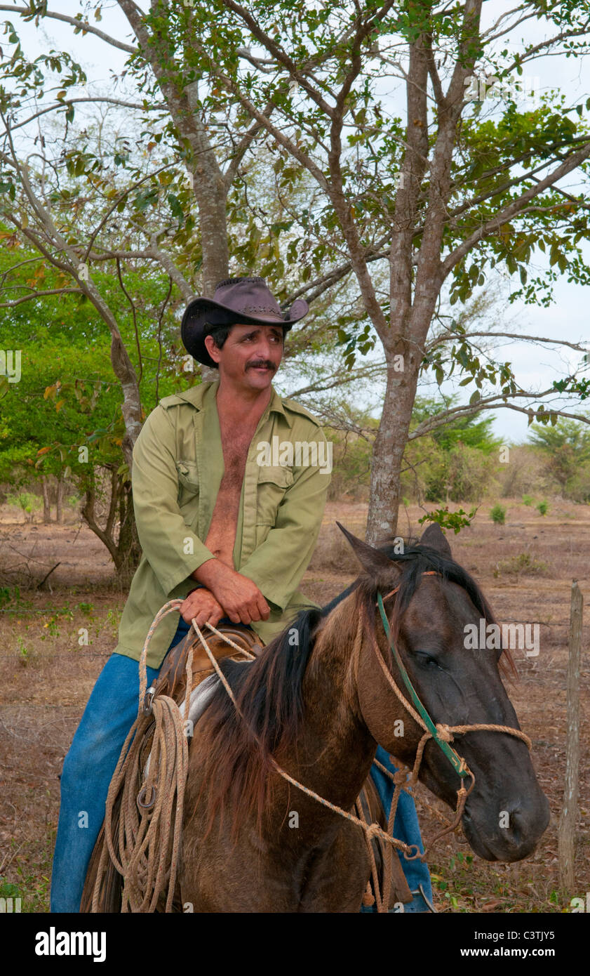 Cuban cowboy on horse in rural country near Trinidad Cuba Stock Photo ...